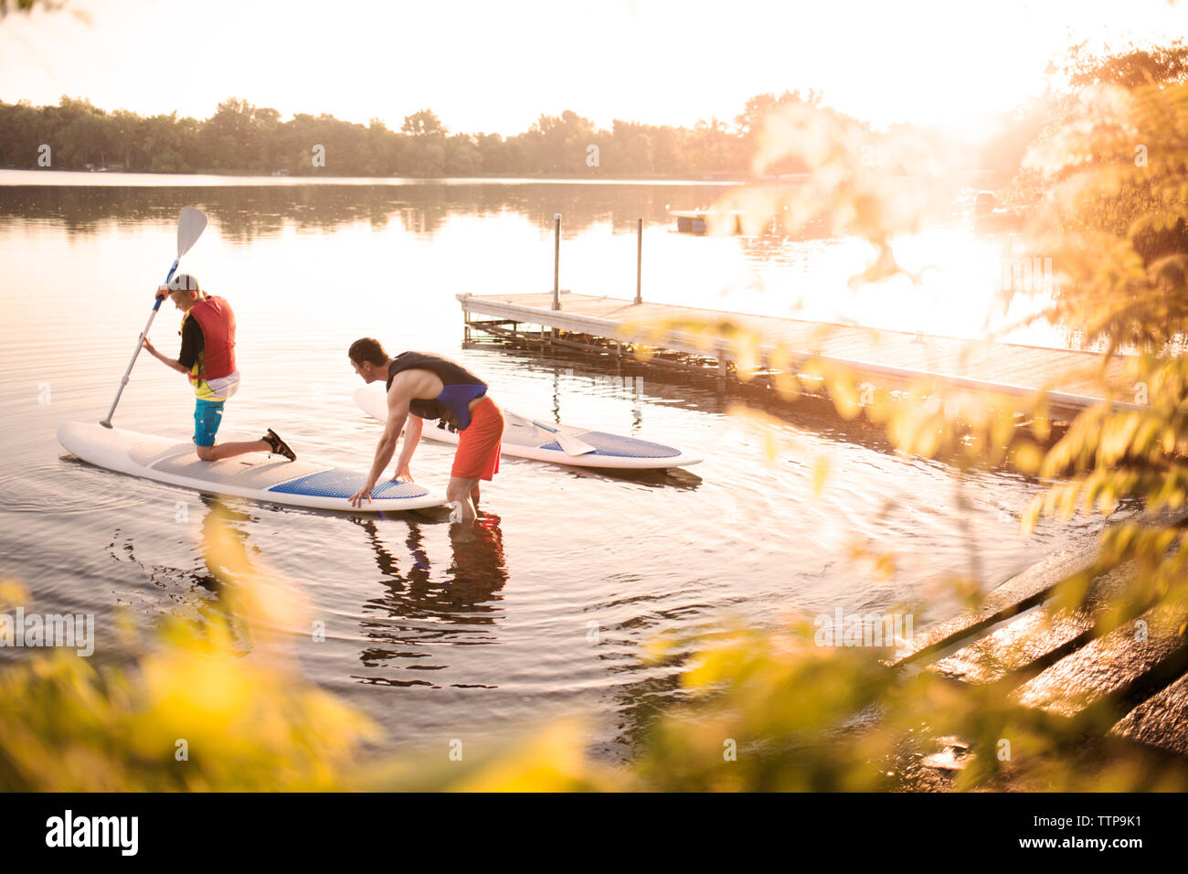 Family paddleboard hi-res stock photography and images - Alamy