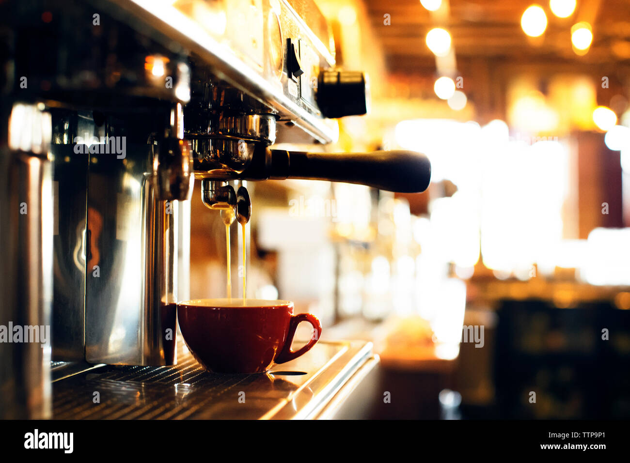Pouring cup coffee from machine hi-res stock photography and images - Alamy