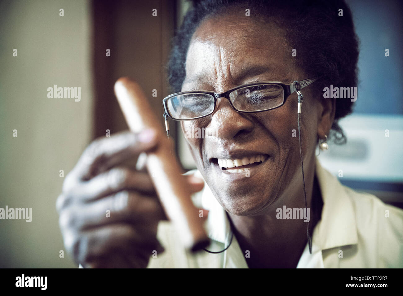 With small cigar hi-res stock photography and images - Alamy