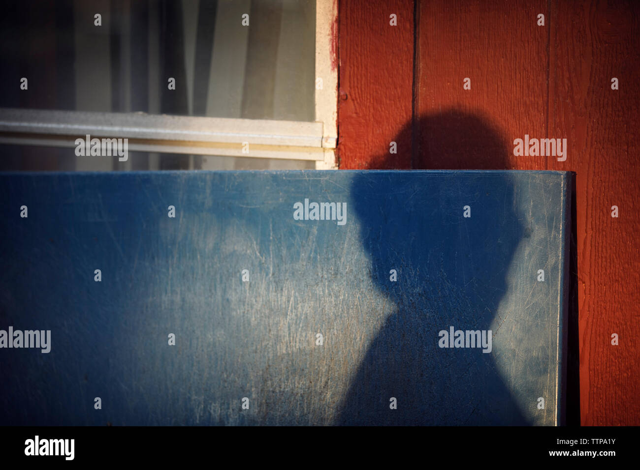 Shadow of woman on wall Stock Photo - Alamy