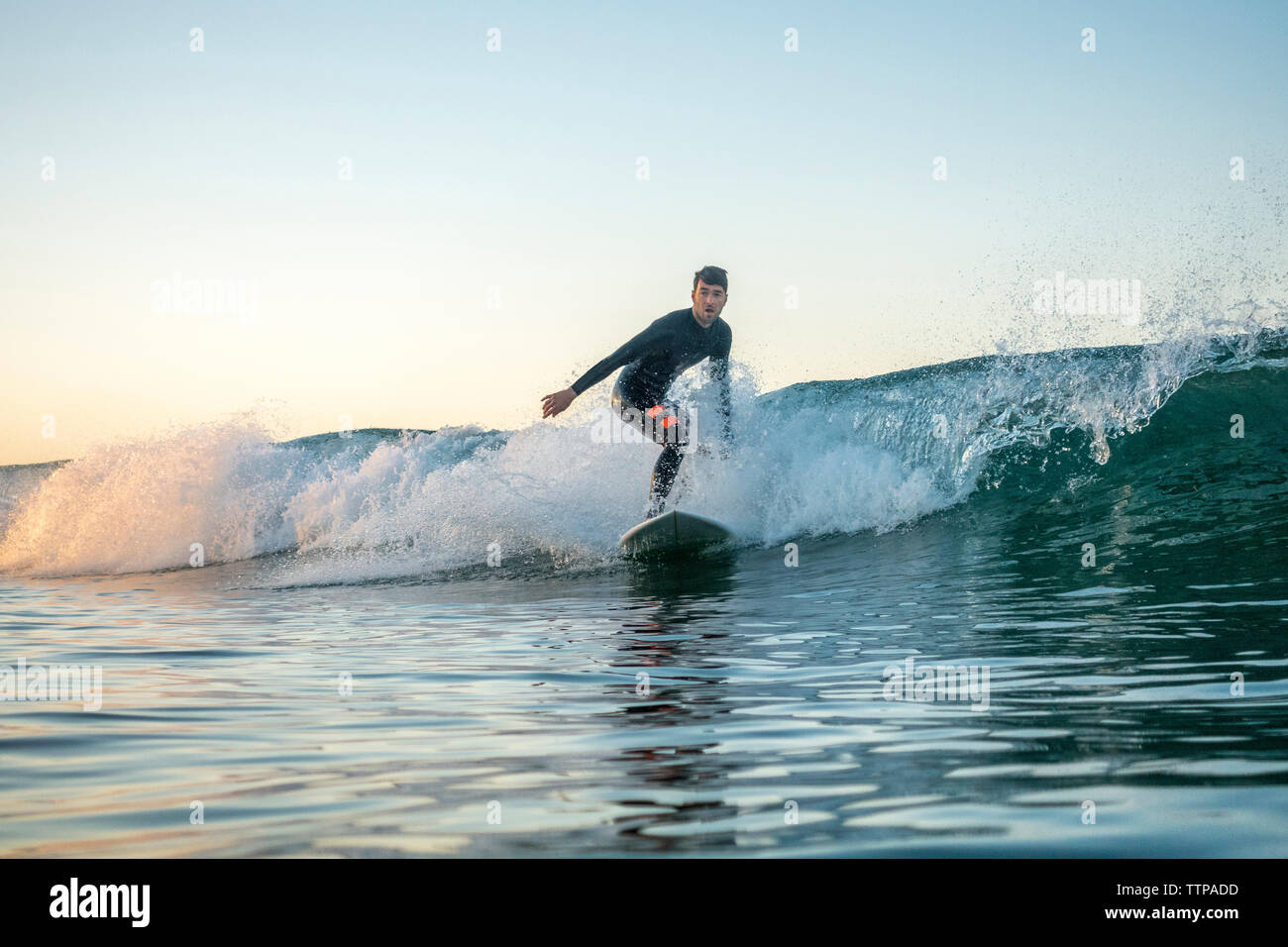 Huge surfing waves hi-res stock photography and images - Alamy