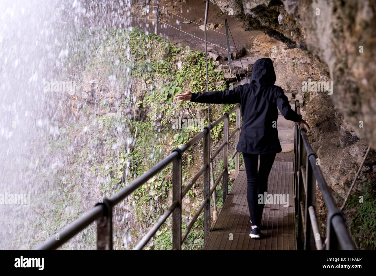 Woman walking footbridge architecture hi-res stock photography and ...