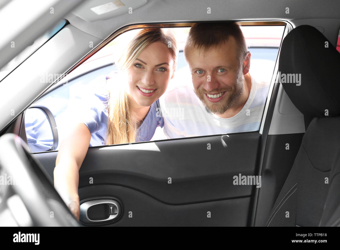 Portrait happy family inside car hi-res stock photography and images ...