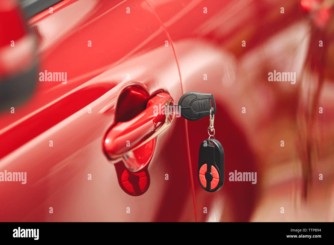 Car key in lock of door Stock Photo - Alamy