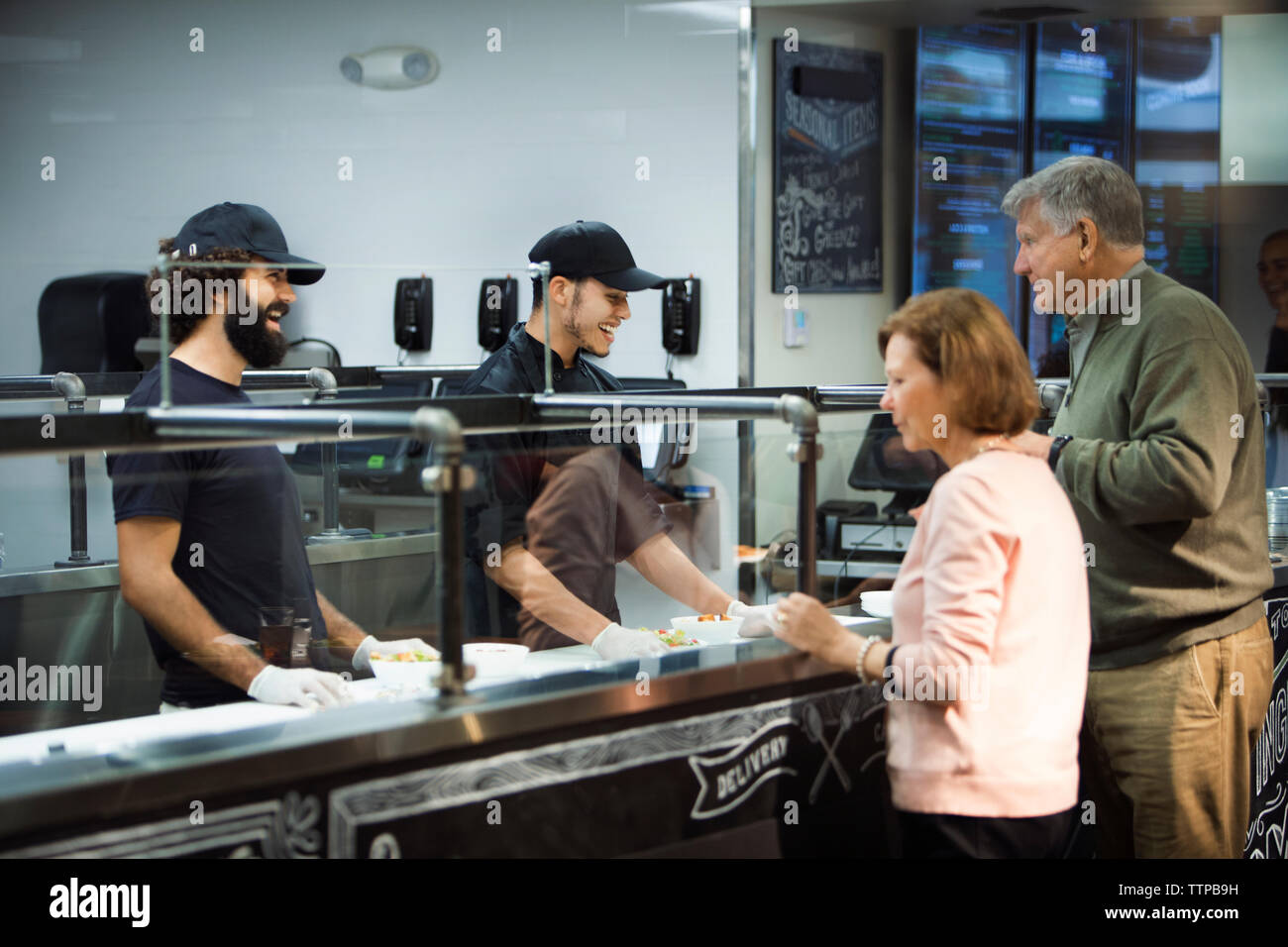 Ordering food restaurant hi-res stock photography and images - Alamy