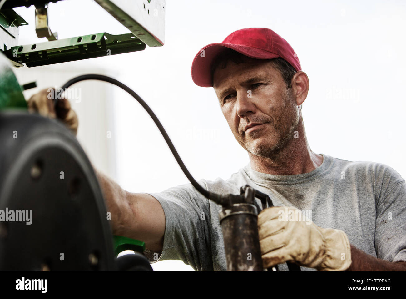 Repairing farm machinery hi-res stock photography and images - Alamy