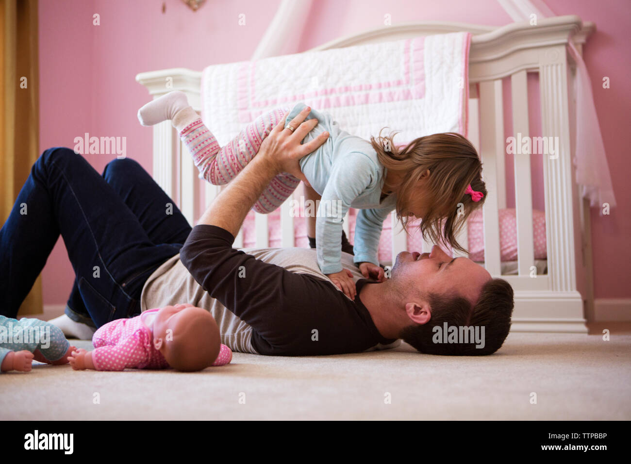 Father lifting up daughter on hi-res stock photography and images - Alamy