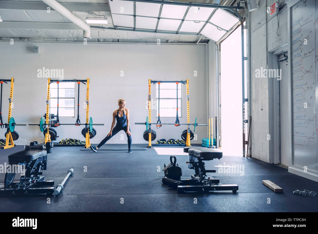 Woman legs up against wall hi-res stock photography and images - Alamy