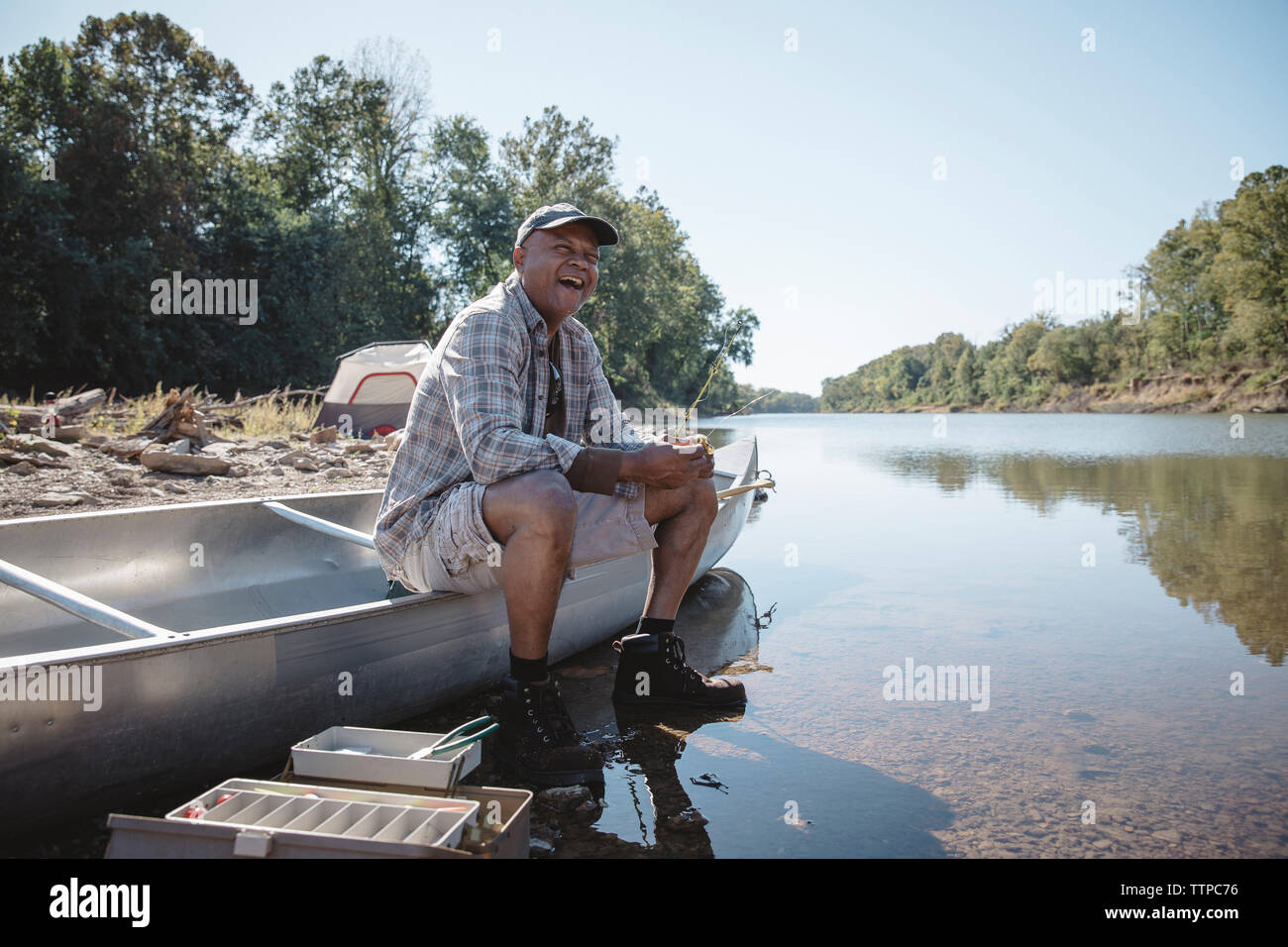 Cheerful happy man holding hi-res stock photography and images - Alamy