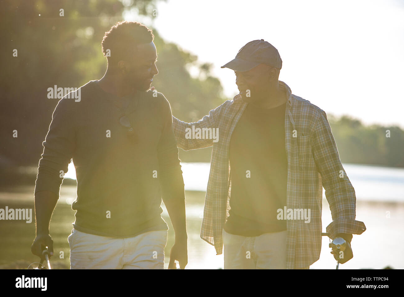 Two friends lake talking hi-res stock photography and images - Alamy