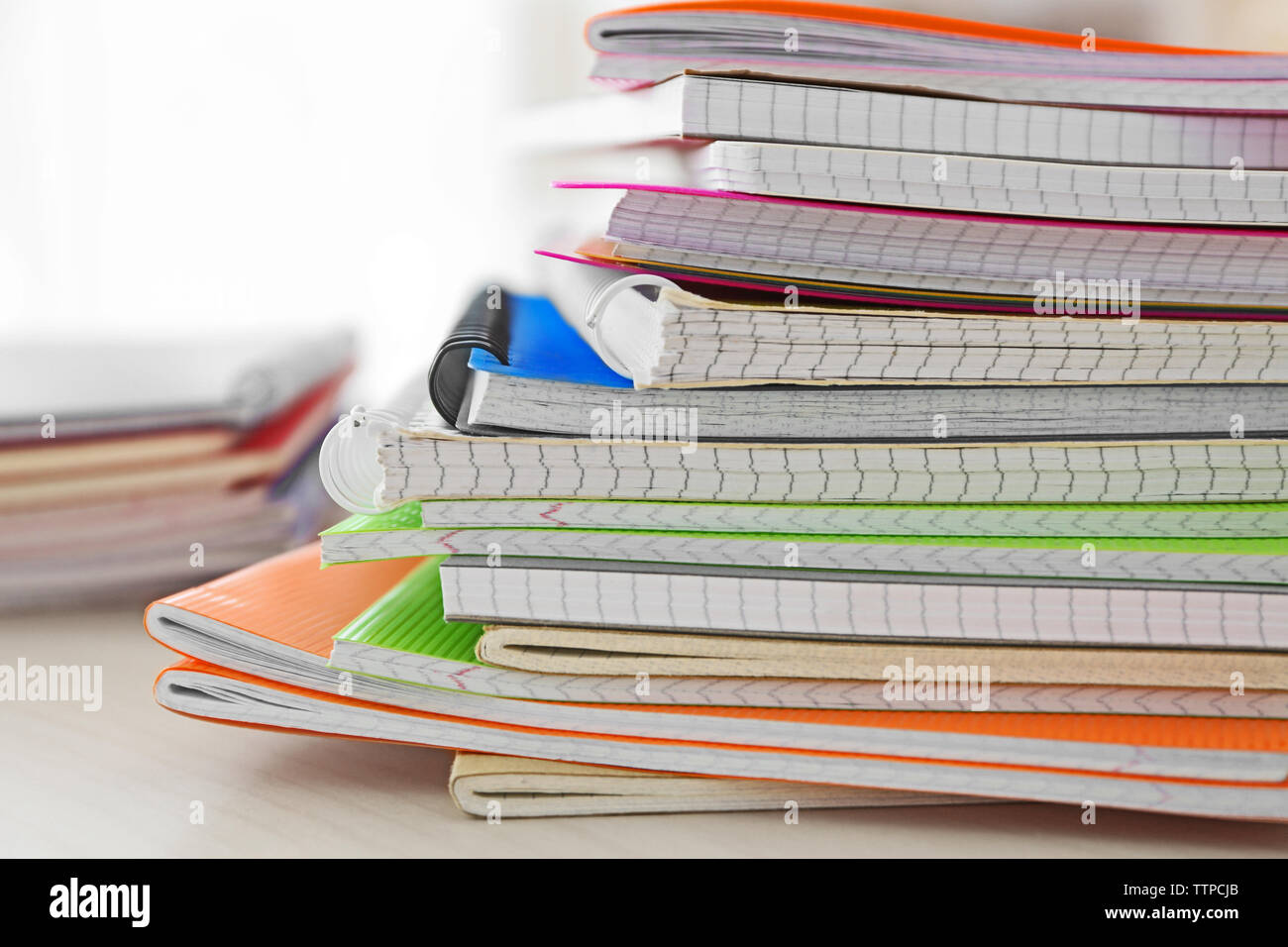 Books stack spiral table hi-res stock photography and images - Alamy