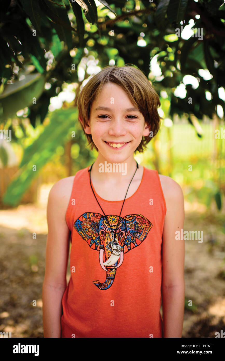 Boy portrait smiling standing hi-res stock photography and images - Alamy