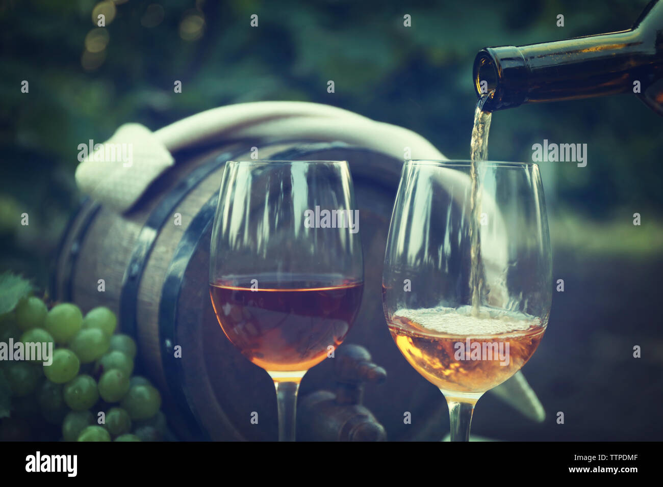 Pouring wine in glass in vineyard Stock Photo - Alamy