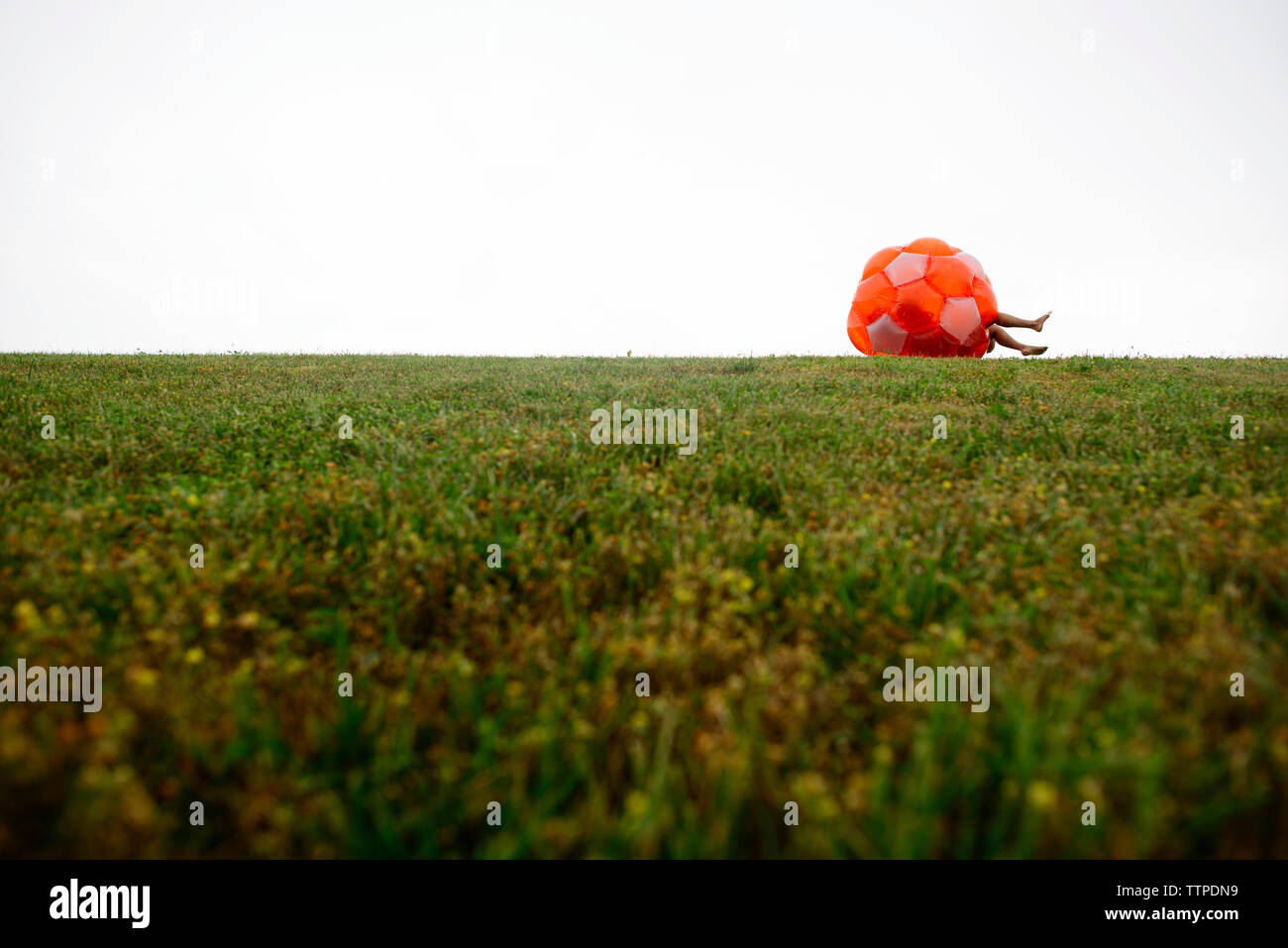 Rolling inside ball hi-res stock photography and images - Alamy
