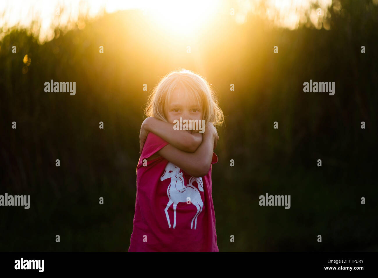 Hugging self hi-res stock photography and images - Alamy