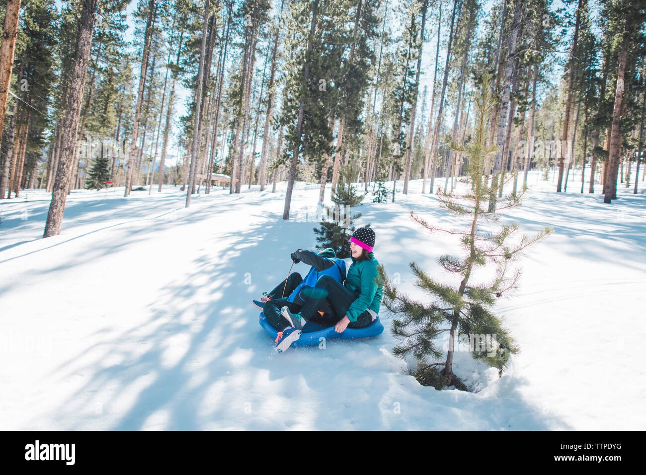 Sliding on snow hi-res stock photography and images - Alamy