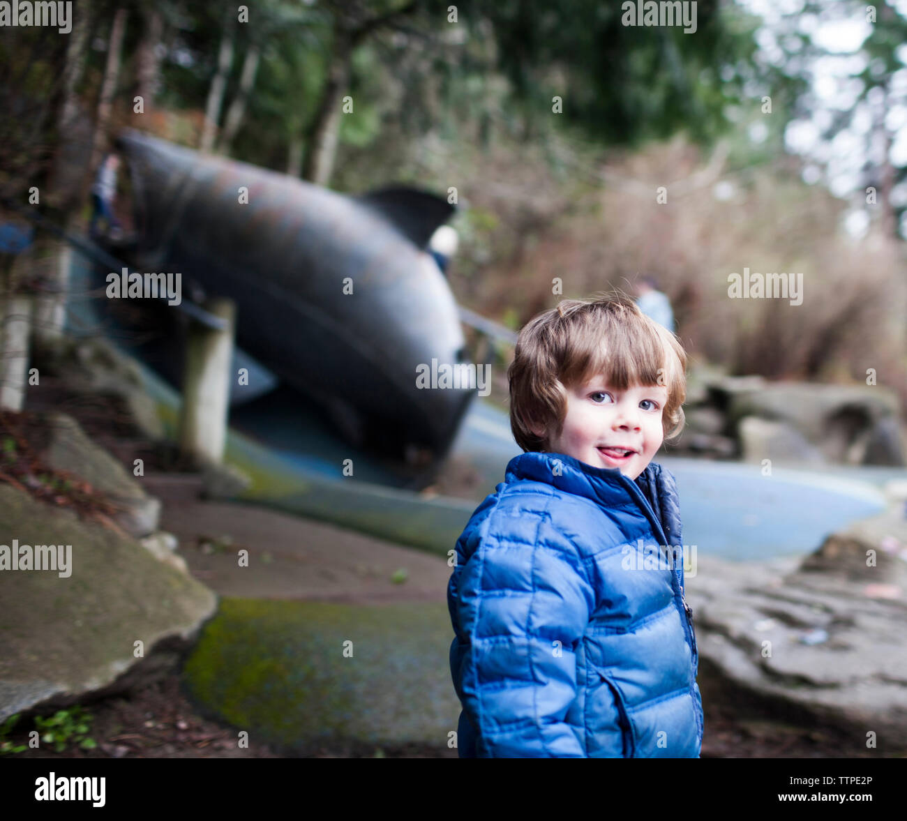 Boy while standing hi-res stock photography and images - Alamy