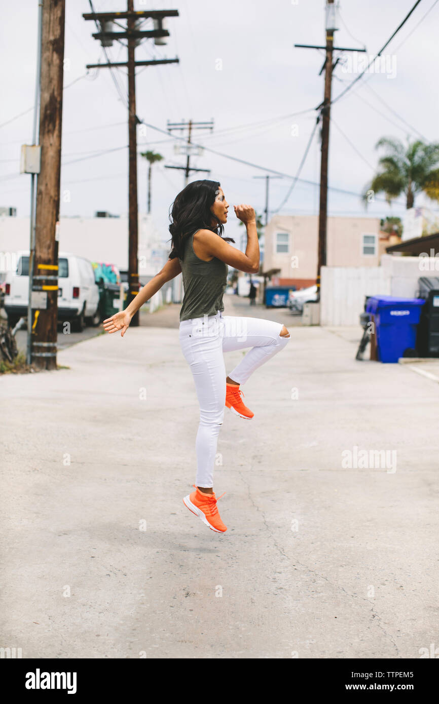 Healthy woman jumping hi-res stock photography and images - Alamy