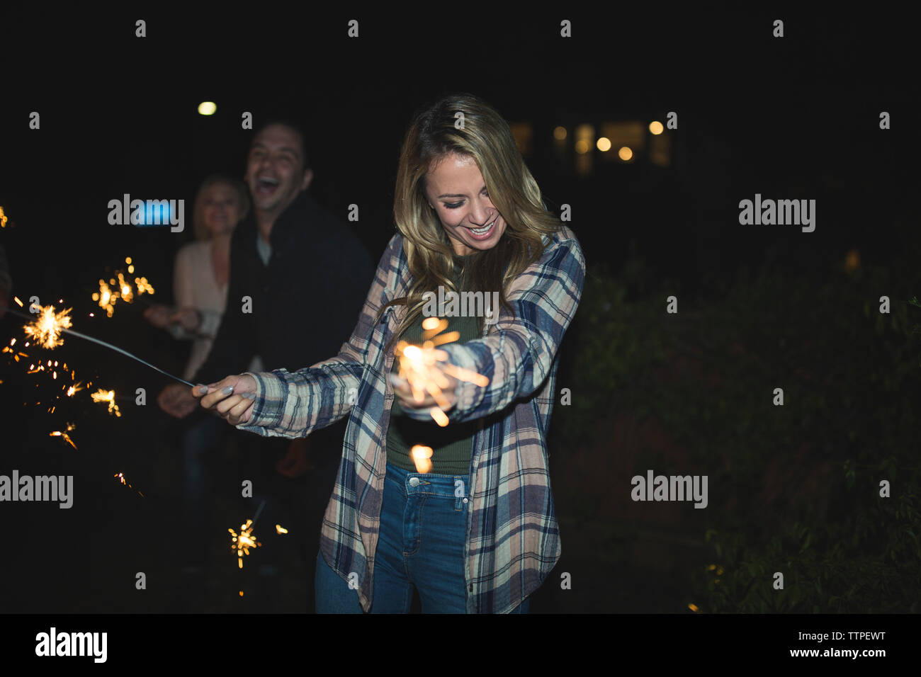 Friends with sparklers hi-res stock photography and images - Alamy