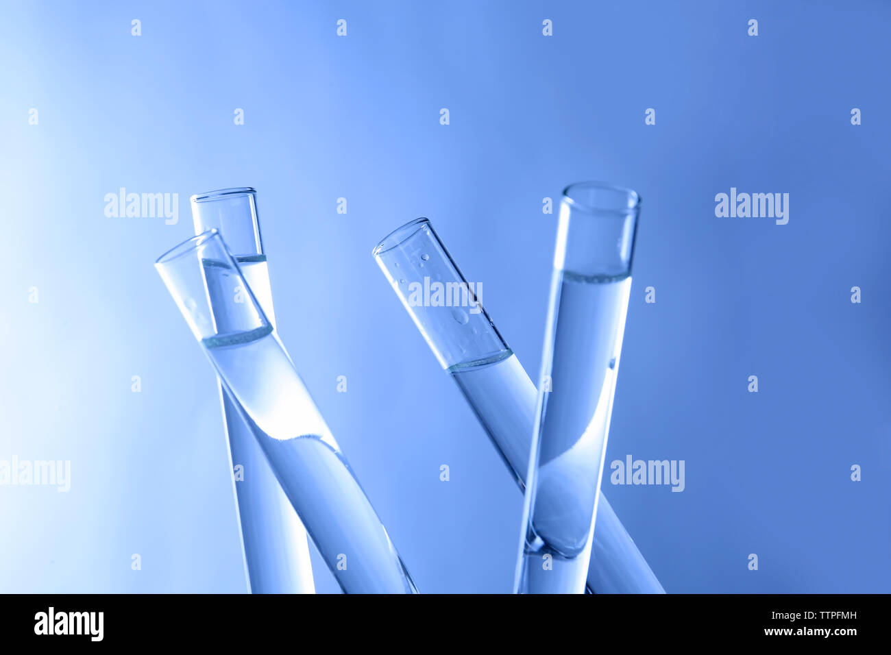 Test tubes, blue toned Stock Photo - Alamy