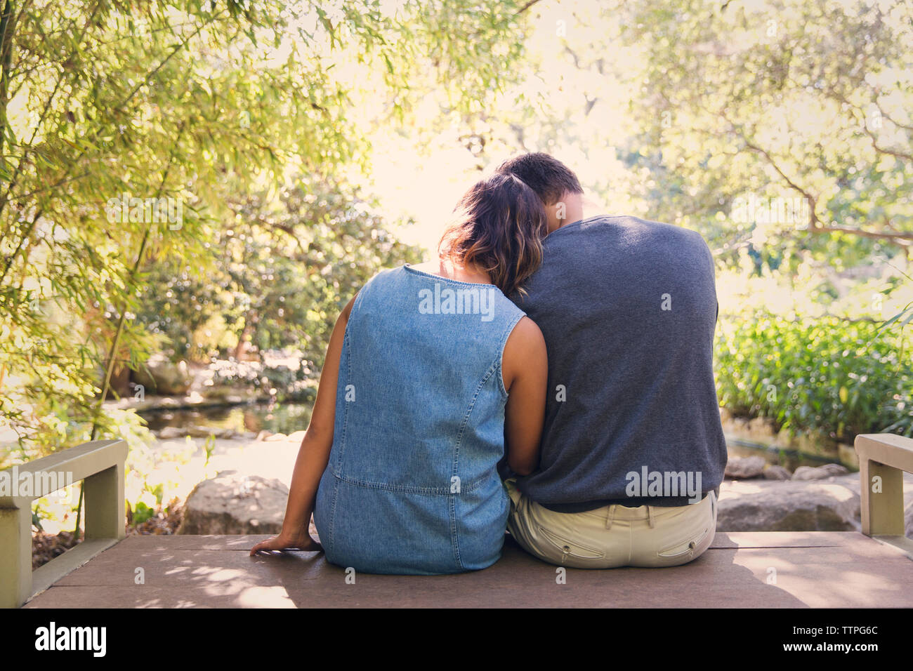 Rear view sitting love hi-res stock photography and images - Alamy