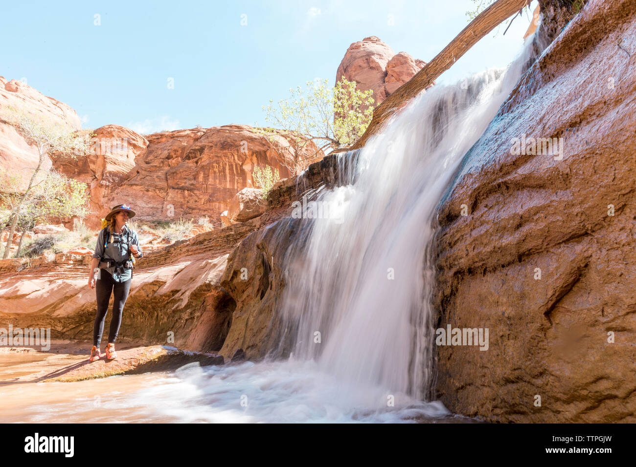 Waterfall adventure woman hi-res stock photography and images - Alamy