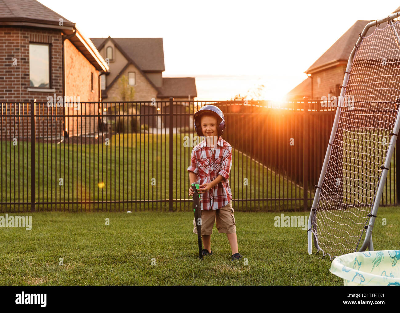 Boy with bat hi-res stock photography and images - Alamy