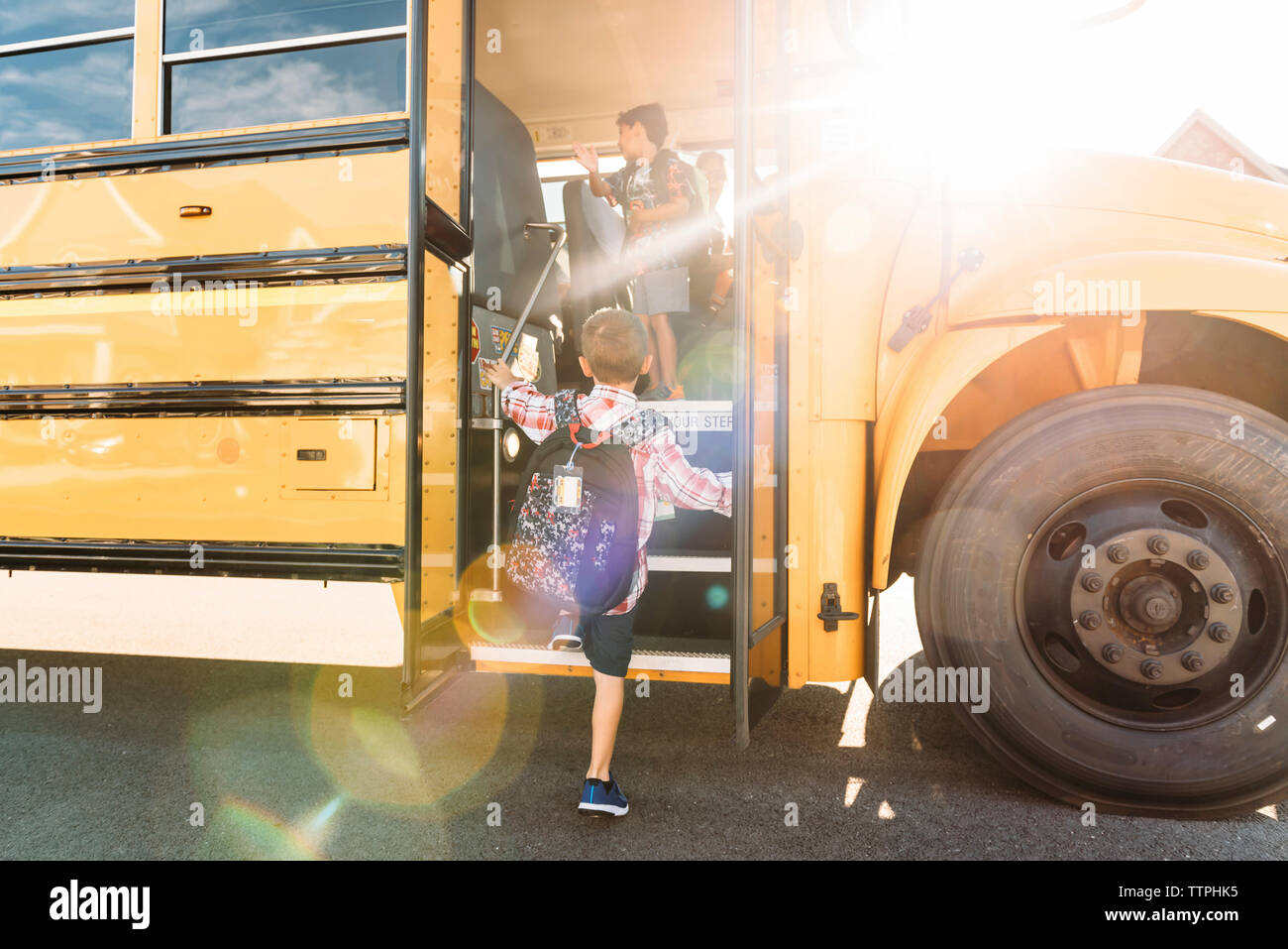 People stepping on bus hi-res stock photography and images - Alamy