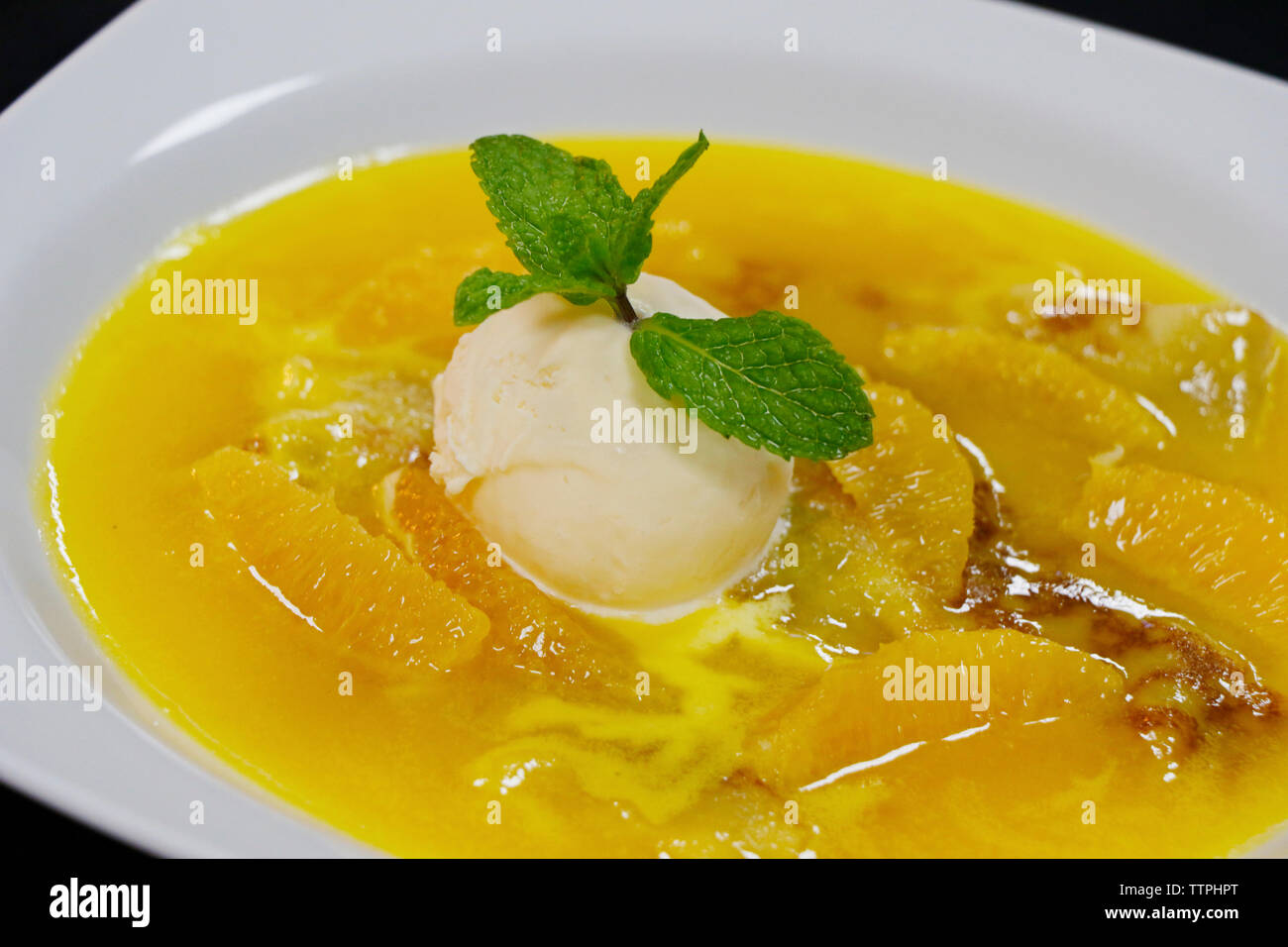 crepe Suzette flambe, one of the traditional french dessert Stock Photo ...