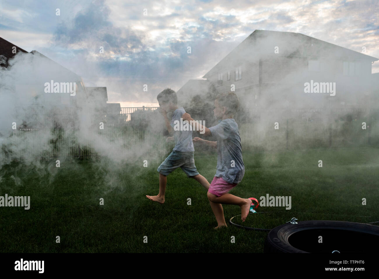Two houses smoke hi-res stock photography and images - Alamy