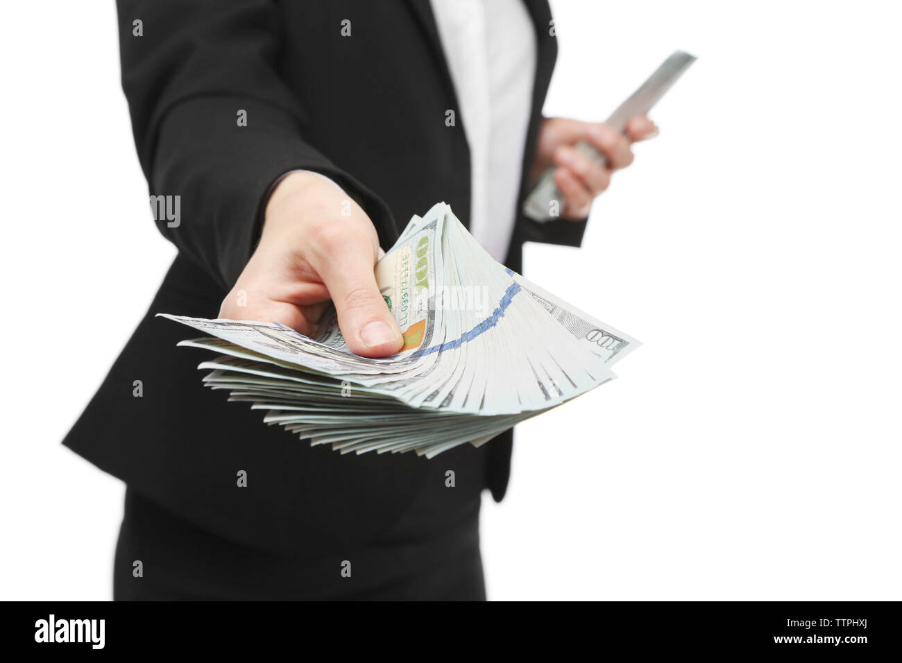 Woman in black suit offering money Stock Photo - Alamy