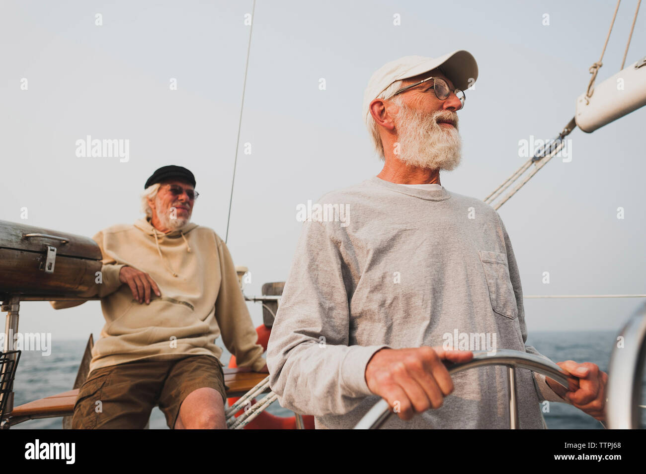 Senior man on sailing boat hi-res stock photography and images - Alamy