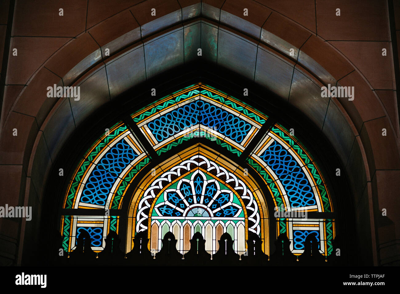 Stained glass arch window in mosque Stock Photo - Alamy