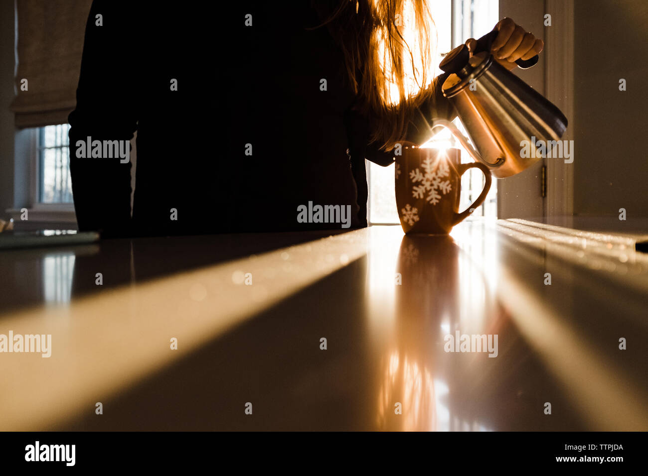 Woman tea kettle hi-res stock photography and images - Alamy