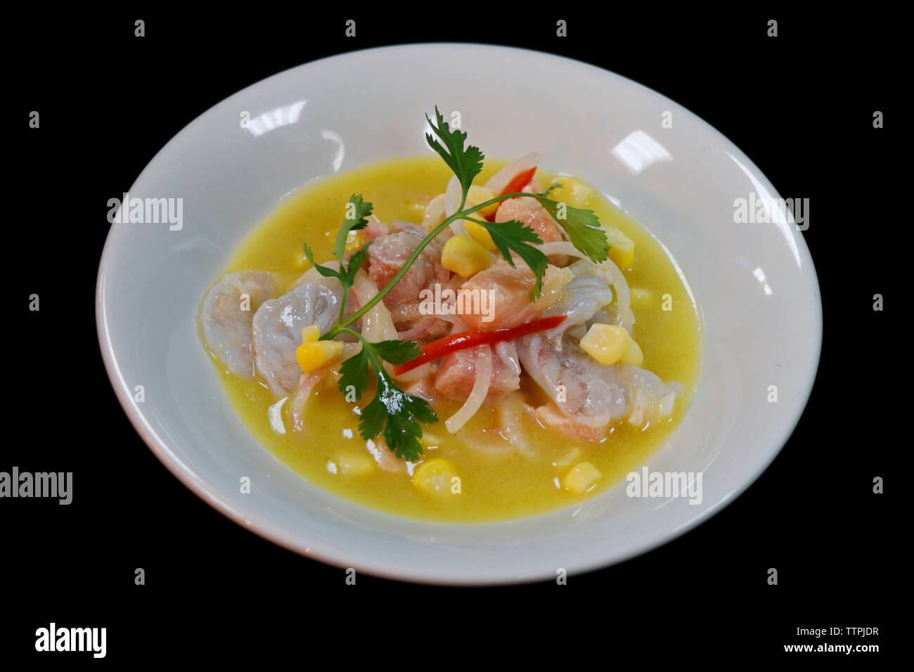 Peruvian seafood ceviche in a bowl with black background Stock Photo ...