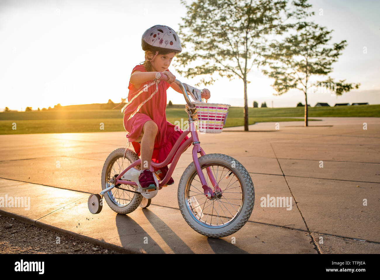 Bicycle with training wheels hi-res stock photography and images - Alamy