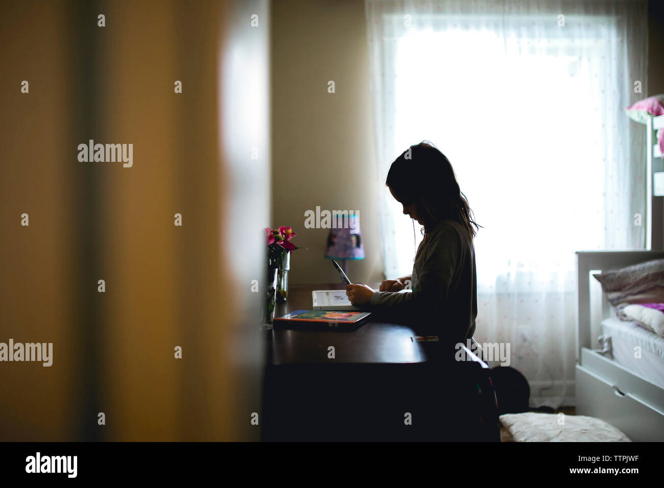 Side view girl in silhouette hi-res stock photography and images - Alamy