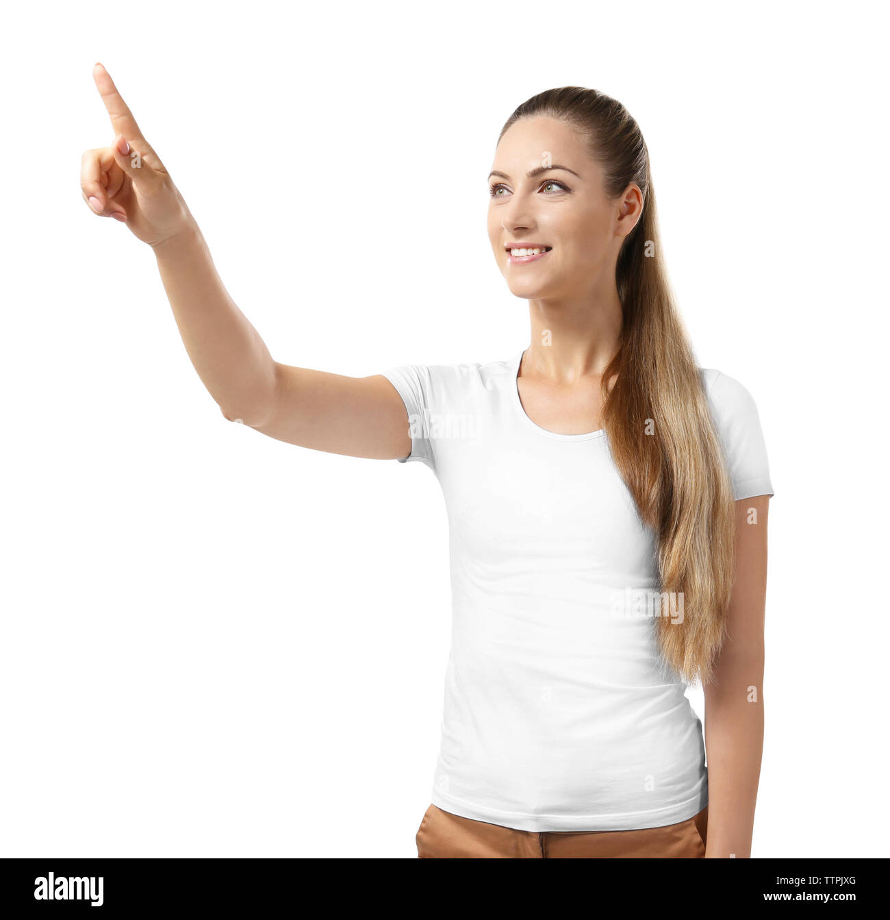 Beautiful girl pointing finger, isolated on white Stock Photo - Alamy