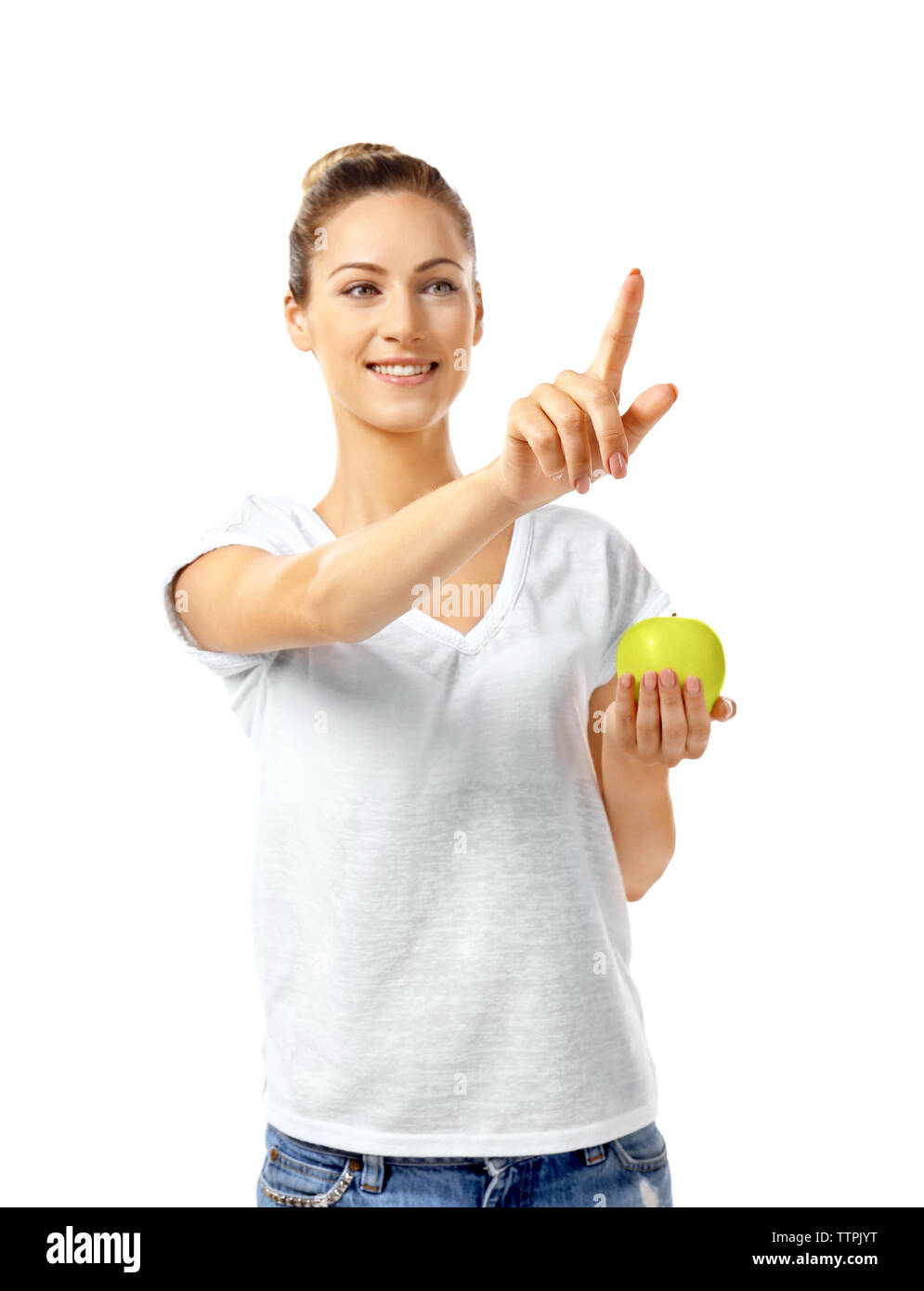 Beautiful girl with apple pointing finger, isolated on white Stock ...