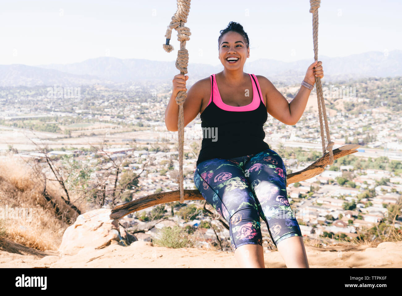 Swinging on rope hi-res stock photography and images - Alamy