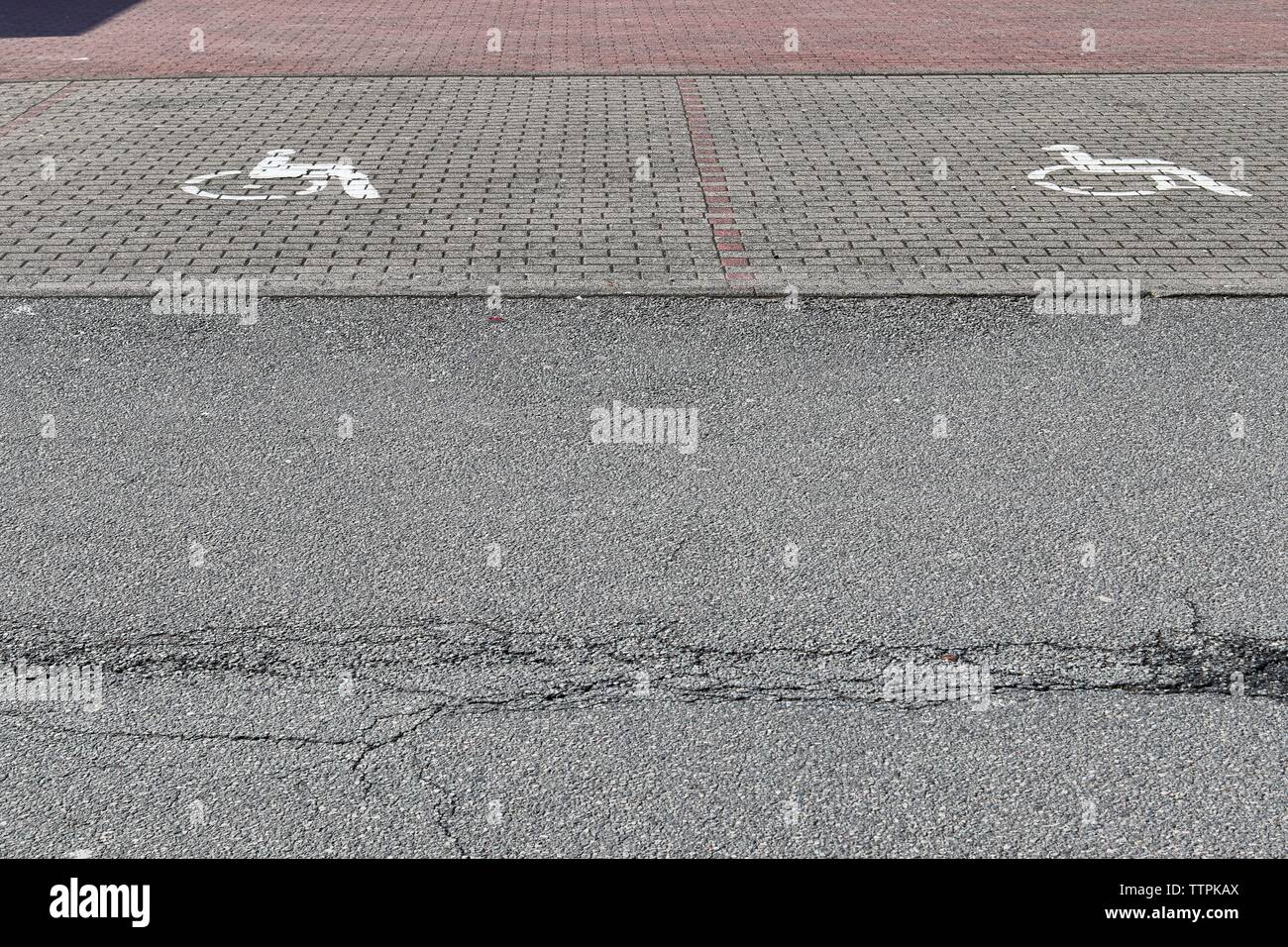 Detailed view on different symbols and lines painted on german streets ...