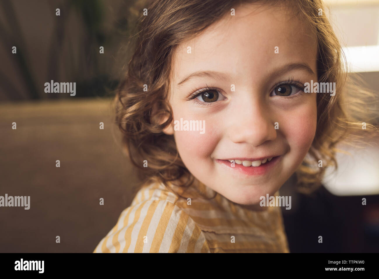 Close-up portrait of cute smiling girl Stock Photo - Alamy