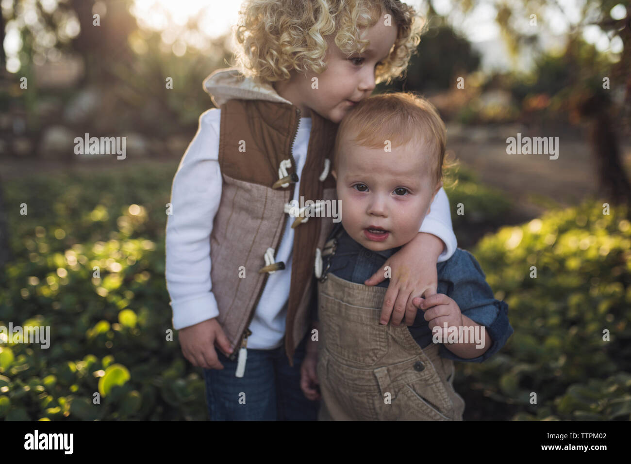 Brothers kissing hi-res stock photography and images - Alamy