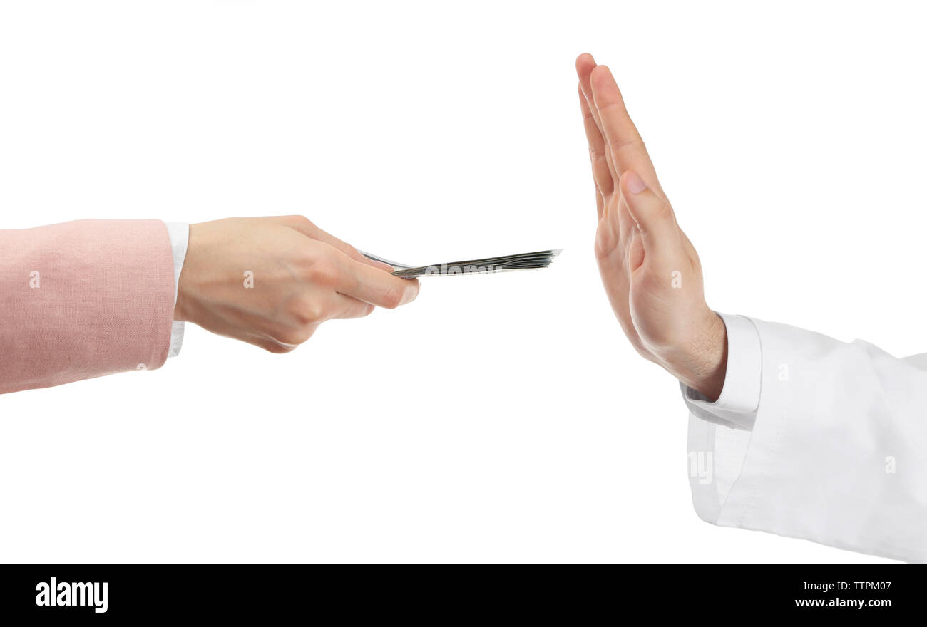 Doctor refusing to take bribe. Corruption concept Stock Photo - Alamy
