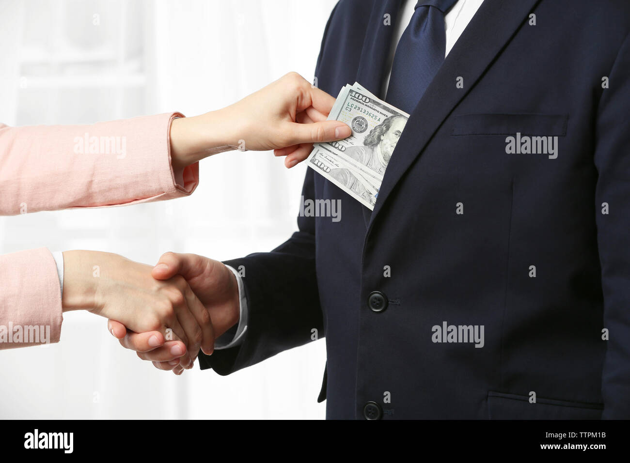 Closeup man hand put banknote hi-res stock photography and images - Alamy