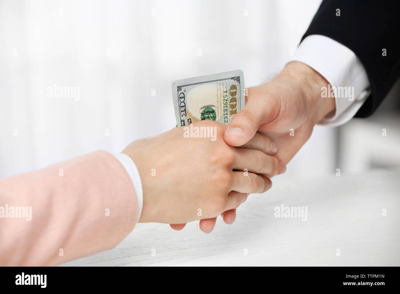 Closeup man hand put banknote hi-res stock photography and images - Alamy
