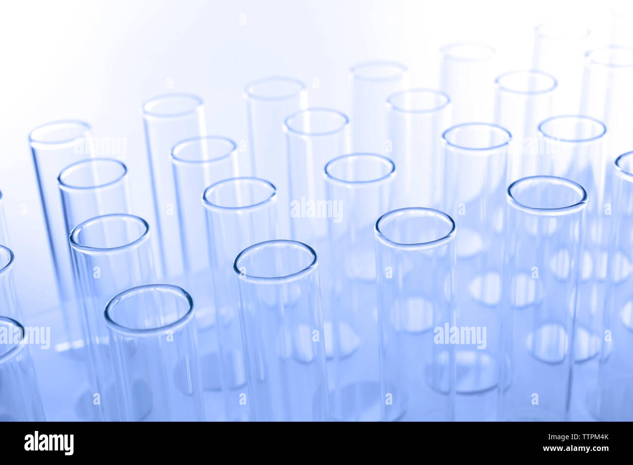 Test tubes on light background Stock Photo - Alamy