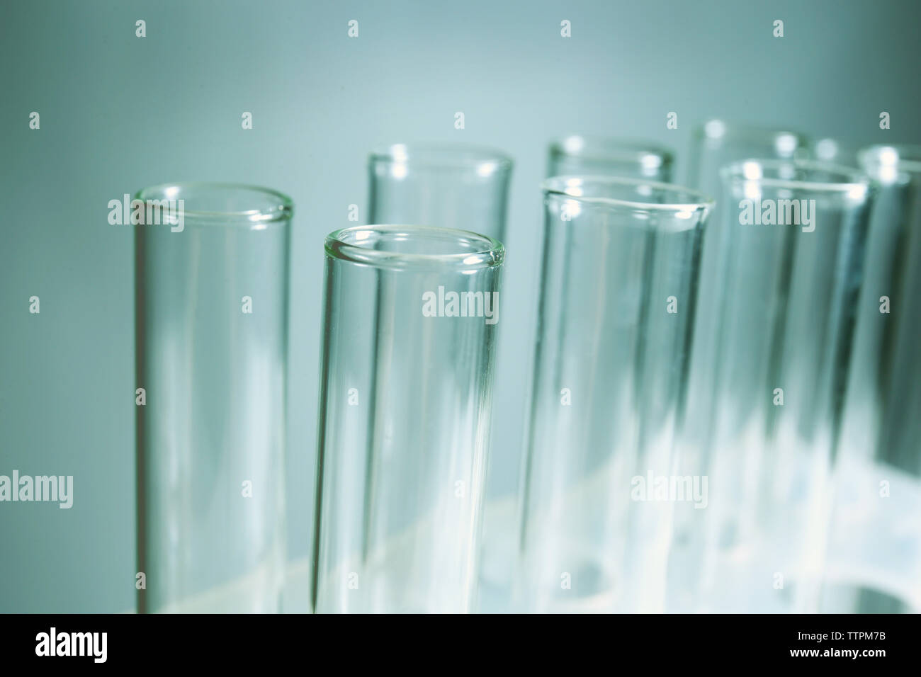 Test tubes on dark background Stock Photo - Alamy