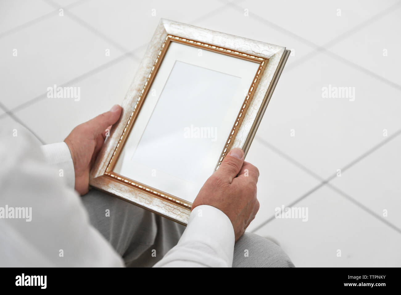 Old man reminiscing hi-res stock photography and images - Alamy