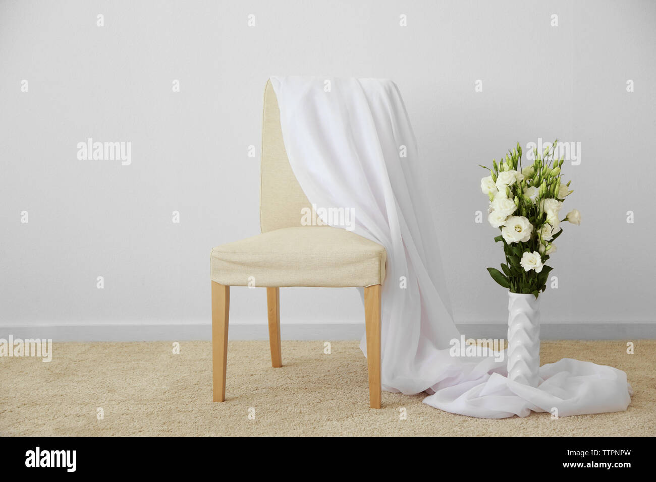 Interior with furniture and decorative flowers Stock Photo - Alamy